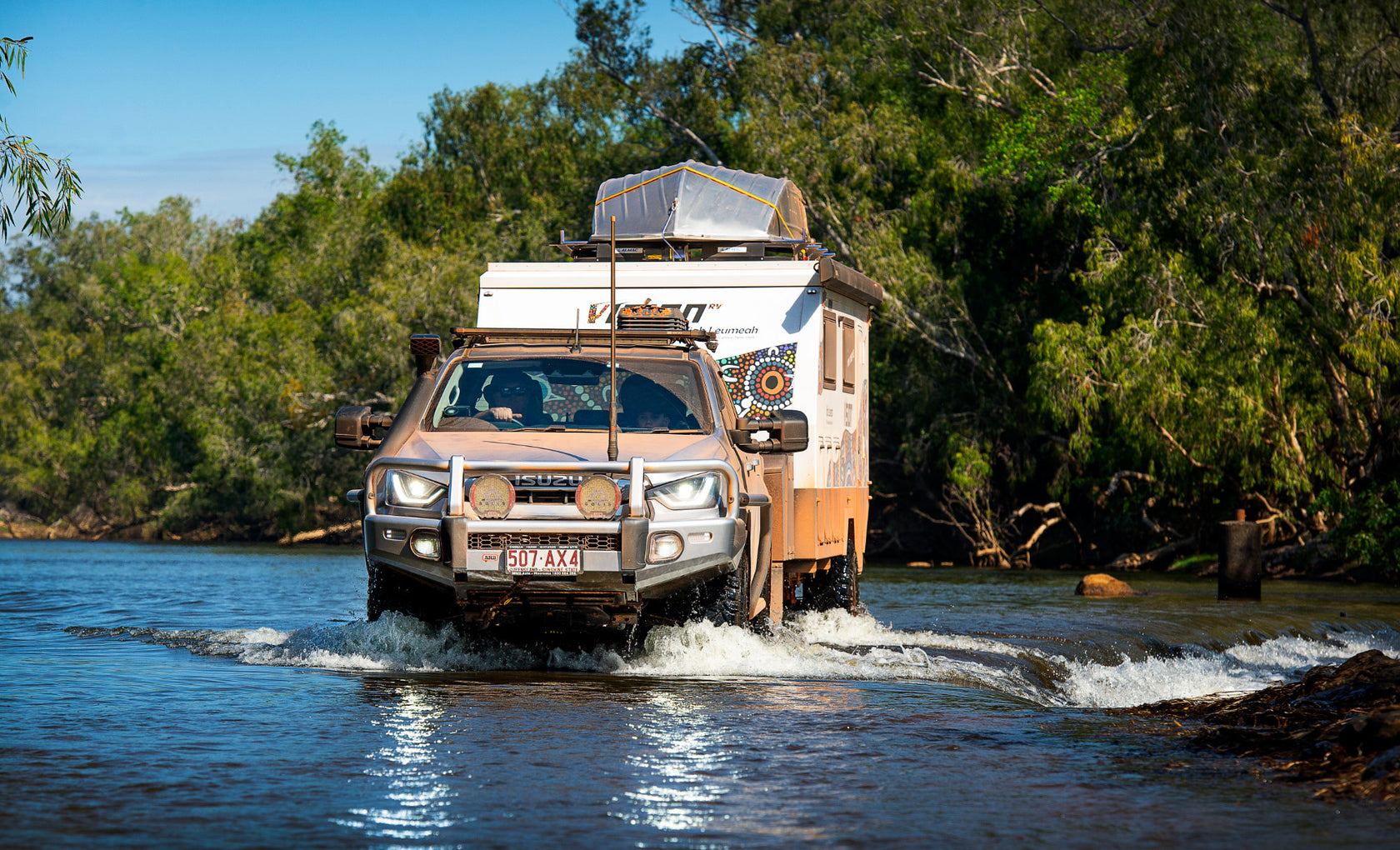 Boat Loaded onto a Hybrid RV – Vision RV Sunseeker
